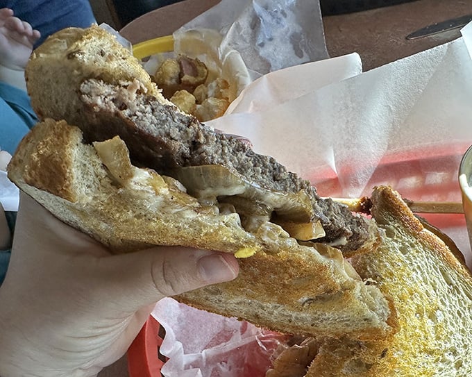 The patty melt&mdash;that perfect marriage of burger and grilled cheese&mdash;executed with the kind of precision that makes you wonder if Einstein had a secret career as a short-order cook.