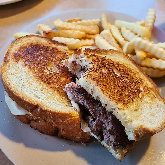 Not just a patty melt&mdash;a work of art. Golden-grilled bread embracing melted cheese and beef in a sandwich that demands to be remembered.