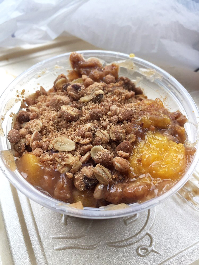 Not just dessert, but Southern salvation in a cup &ndash; peach cobbler with a crumbly topping that would make grandmothers nod in approval.