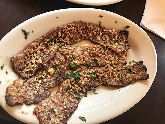 This isn't just bacon&mdash;it's pecan-crusted bacon that's been elevated to art form status, with herbs adding a fresh finish.