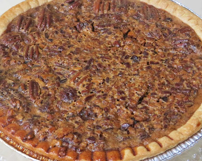 This pecan pie isn't messing around. Dense, rich, and packed with enough nuts to make a squirrel consider breaking and entering.