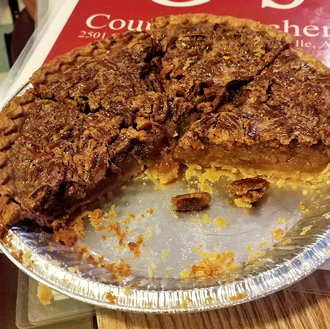 This pecan pie isn't messing around &ndash; with its perfect gooey-to-crunchy ratio and deep amber filling, it's the kind of dessert that makes you consider skipping the main course entirely.
