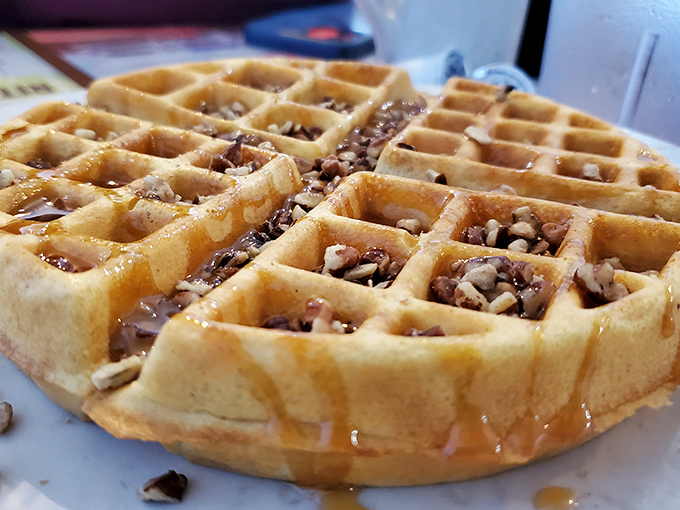 This isn't just any waffle&mdash;it's a pecan-studded masterpiece where every square holds the promise of buttery, maple-drenched bliss.