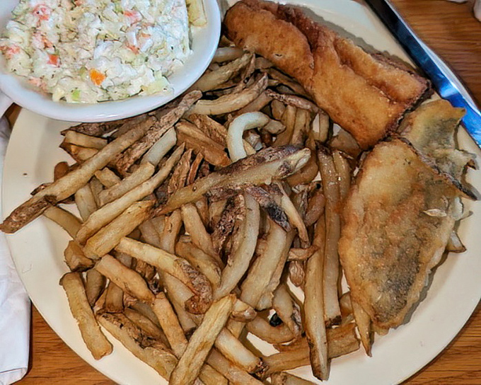 The perch dinner that launched a thousand return visits. Those crispy edges and tender centers create the textbook definition of "just one more bite."