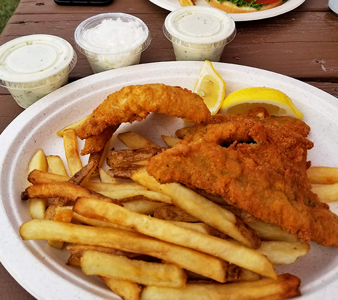 Lake Erie's finest catch, transformed. Crispy walleye fillets and hand-cut fries&mdash;proof that sometimes the best seafood isn't from the ocean.