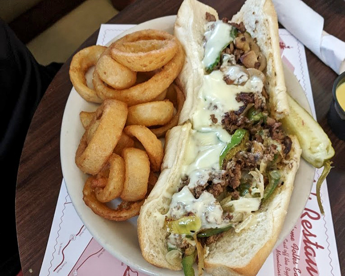 This Philly cheesesteak isn't just a sandwich; it's a beautiful marriage of beef, melted cheese, and peppers that would make Rocky climb those steps again. 