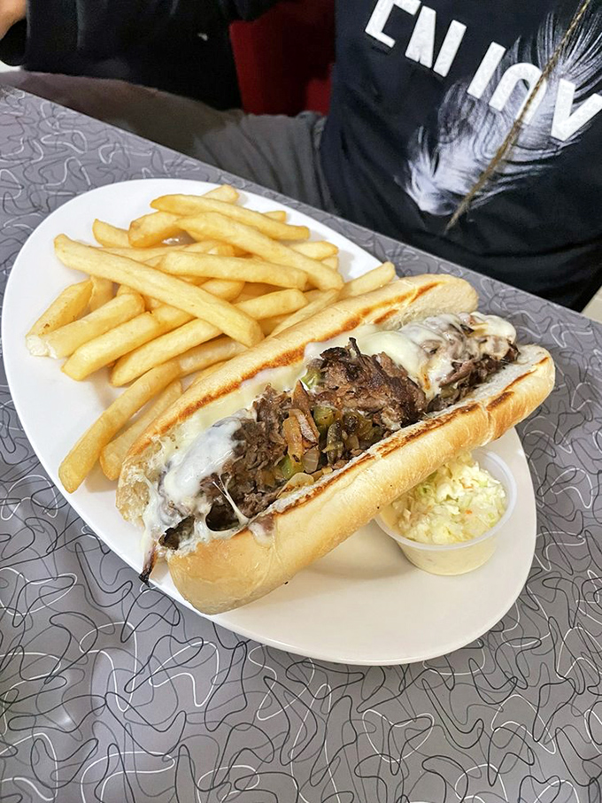 Fried chicken that's audibly crunchy just by looking at it, paired with mashed potatoes wearing gravy like a velvet robe. Comfort food royalty.