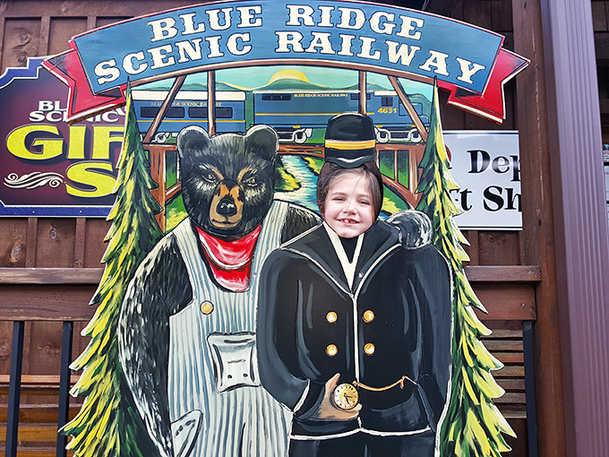 A whimsical photo cutout where kids (and kids-at-heart) can transform into train conductors or befriend a dapper Appalachian bear.