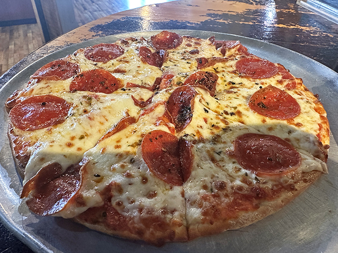 Pizza perfection that doesn't need fancy words. The pepperoni curls at the edges like it's waving hello to your taste buds.