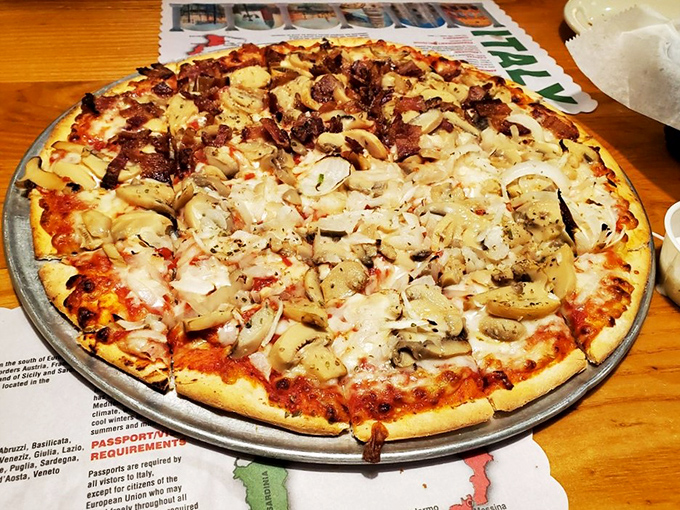 Mushroom pizza perfection that would make even a New Yorker nod in respect. The slightly charred crust is the unsung hero here.