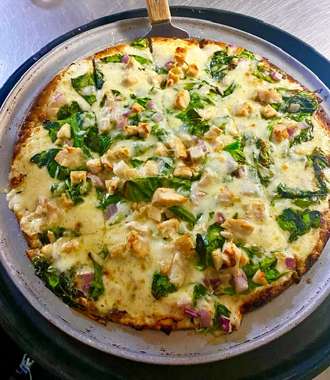 When pizza looks this good in a place famous for prime rib, you know the kitchen doesn't play favorites.