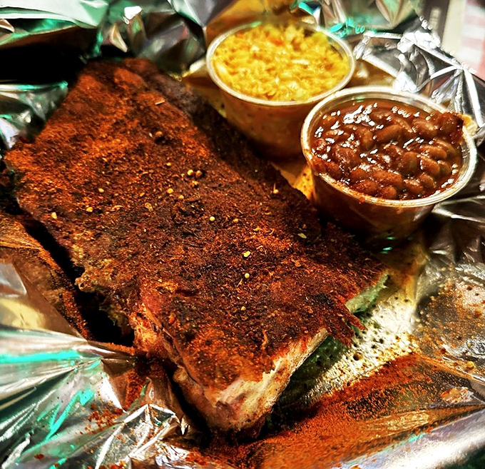 The star of the show: dry-rubbed ribs with that distinctive paprika-hued coating. No sauce needed when the spice blend sings this beautifully.