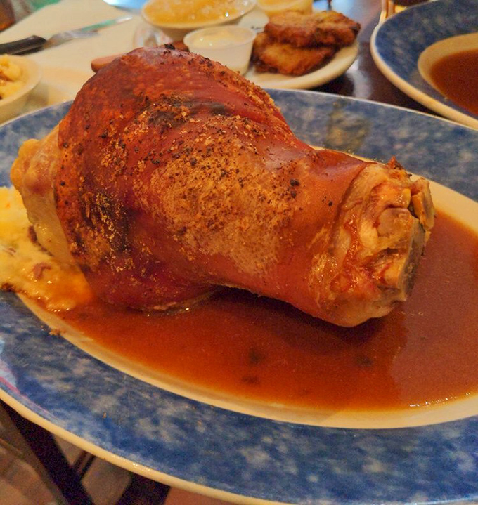 This pork shank isn't just dinner &ndash; it's an edible monument to German engineering, tender meat falling off the bone.