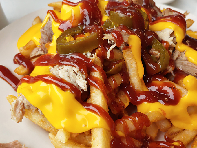 Porky fries &ndash; where french fries decided to dress for a night out with pulled pork, cheese sauce, and jalape&ntilde;os. Diet plans, consider yourselves postponed.