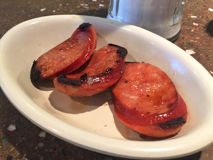 These Portuguese sausages aren't just grilled, they're transformed. Charred perfection that would make any breakfast plate stand at attention.