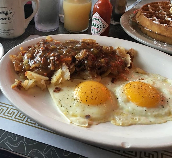 Breakfast nirvana: perfectly cooked eggs, hash browns smothered in gravy, and not a kale leaf in sight. This is why mornings were invented.