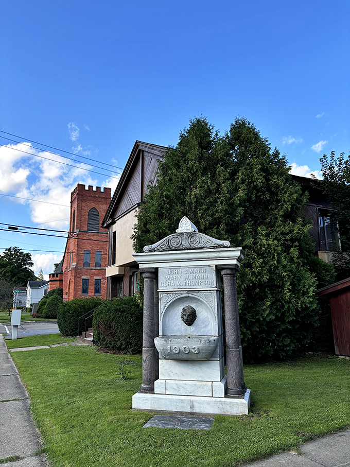 History stands sentinel in stone &ndash; this 1903 monument near a historic church reminds us that small towns treasure their past in ways big cities often forget.