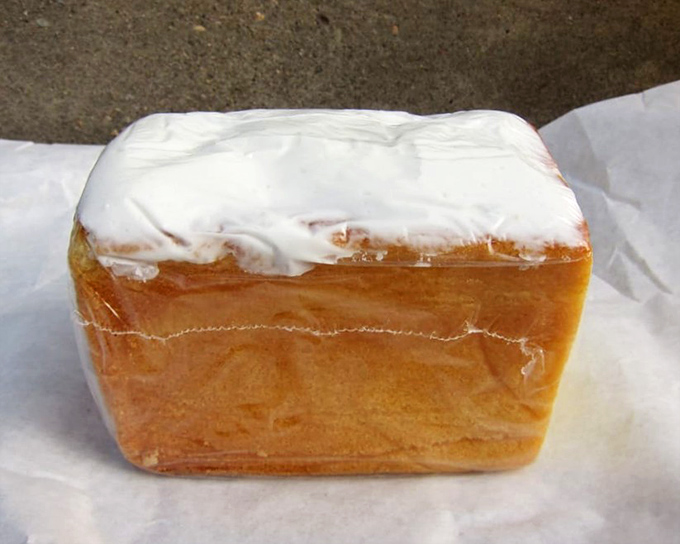 A pound cake so perfectly iced it belongs in the Louvre, though it would be quickly removed for causing excessive drooling.