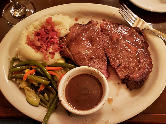 Prime rib that's seen just the right amount of heat, paired with vegetables and mashed potatoes that know their supporting role perfectly.