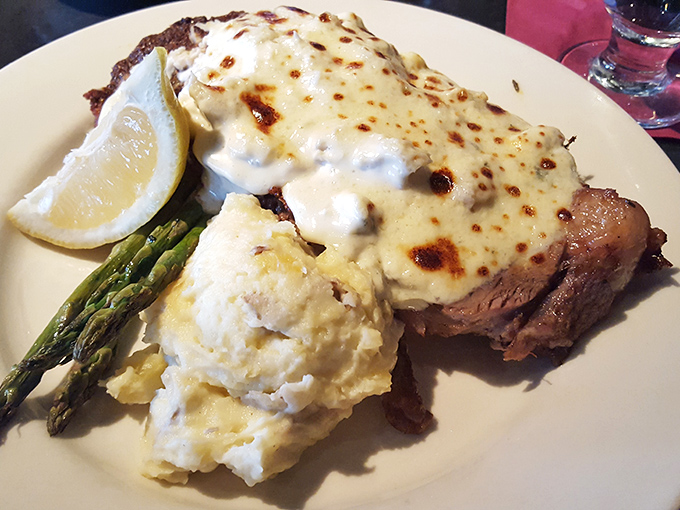 Prime rib that deserves its own Instagram account. Perfectly cooked, topped with melted cheese, and accompanied by mashed potatoes that could make a grown adult weep.