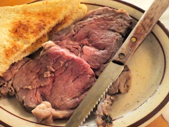 Prime rib so tender you barely need the knife &ndash; this isn't just meat, it's a Montana love letter served with golden toast.