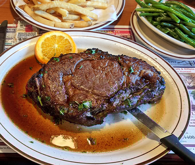 This isn't just prime rib&mdash;it's a masterclass in carnivorous pleasure, complete with an orange slice winking at you from the plate.