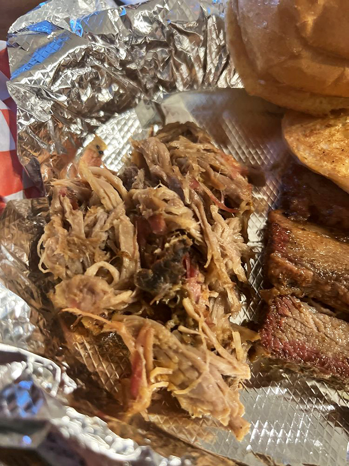 Pulled pork so tender it practically pulled itself. The kind of meat that makes you wonder why you ever bothered with other food groups.