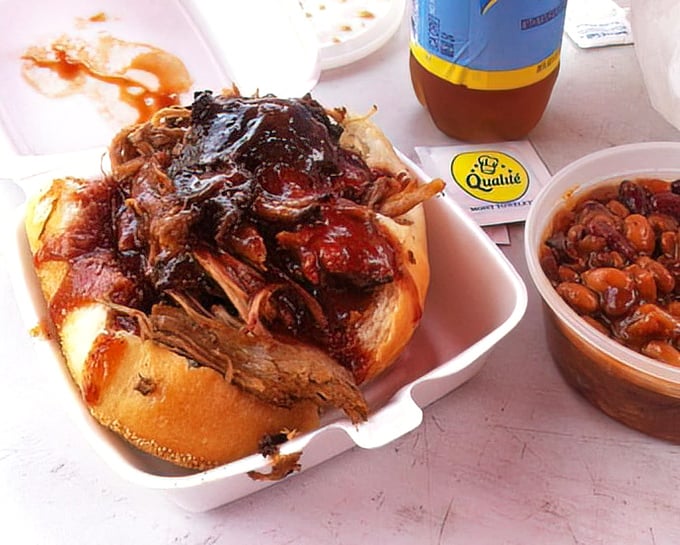 This pulled pork sandwich isn't just a meal, it's a commitment&mdash;gloriously sauced and ready to transform your ordinary lunch into something extraordinary.