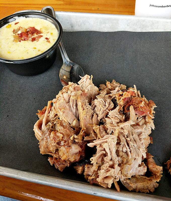 Pulled pork so tender it practically pulled itself. That side of mac and cheese isn't just a companion; it's a soulmate.