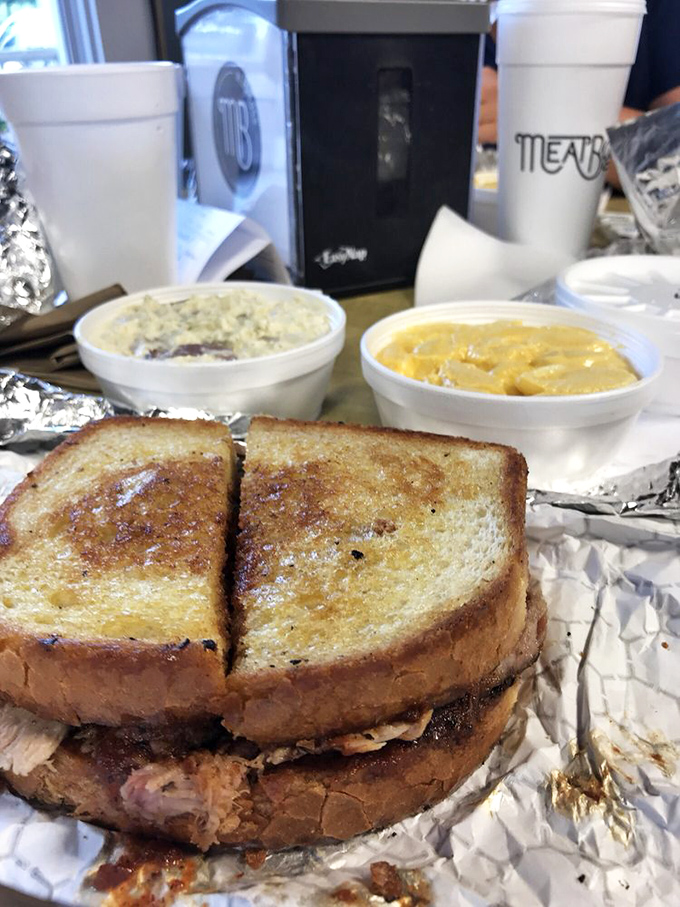 Behold the grilled cheese sandwich that went to finishing school&mdash;upgraded with smoky pulled pork and flanked by creamy sides.