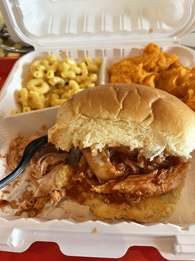A proper pulled chicken sandwich that doesn't know the meaning of dry, nestled alongside mac and cheese that deserves its own fan club.