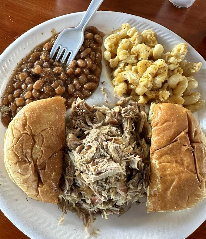 This pulled pork sandwich isn't messing around&mdash;tender strands of smoky meat nestled between bread with sides that don't know the meaning of "afterthought."
