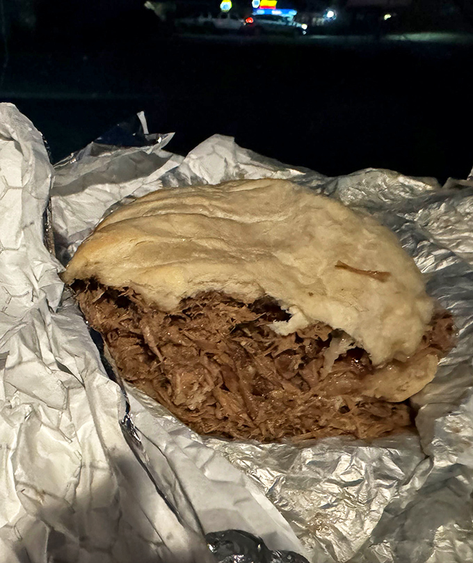 This pulled pork sandwich isn't just a meal, it's an edible hug wrapped in a soft bun. Comfort food that speaks Pennsylvania with a Southern accent.