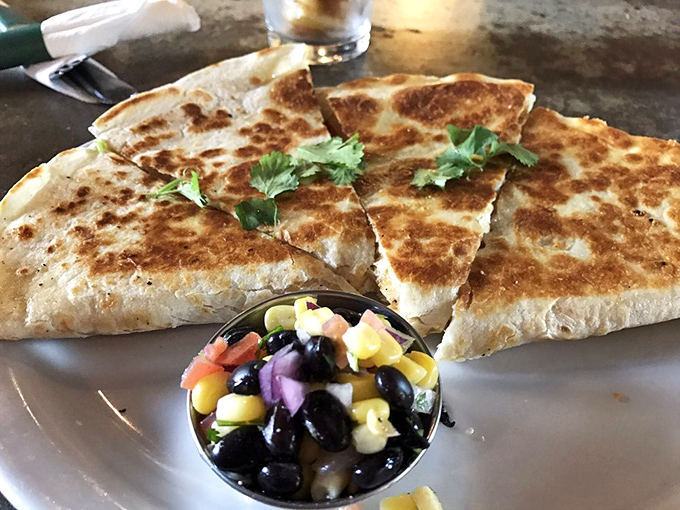 Quesadillas with a side of black bean salsa&mdash;proof that Green Truck's talents extend well beyond the burger universe.
