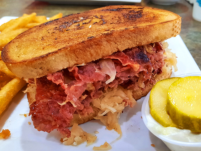 The Reuben sandwich: where corned beef, sauerkraut, and toasted rye bread come together like the world's most delicious architectural project.