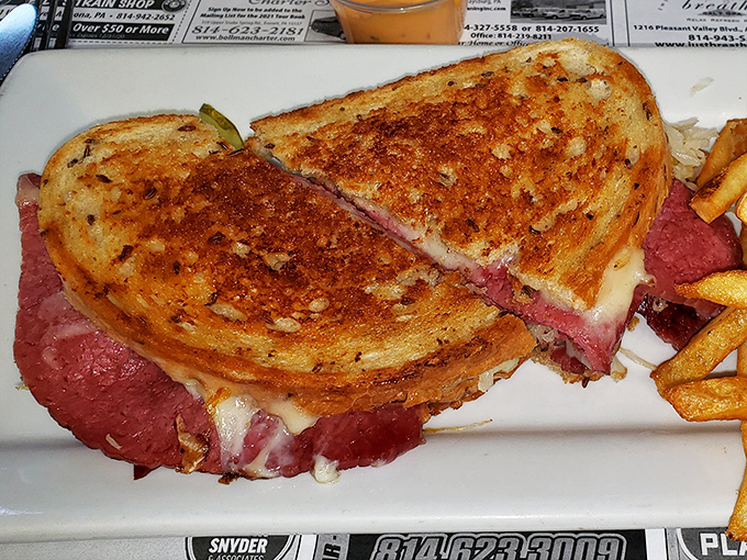 This Reuben isn't just a sandwich&mdash;it's architecture. Perfectly grilled bread creating a golden cathedral for that glorious corned beef congregation.