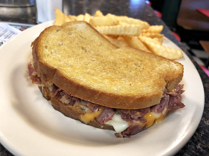 The Reuben that launched a thousand road trips. Perfectly grilled bread holding the ideal ratio of meat, cheese, and sauerkraut.