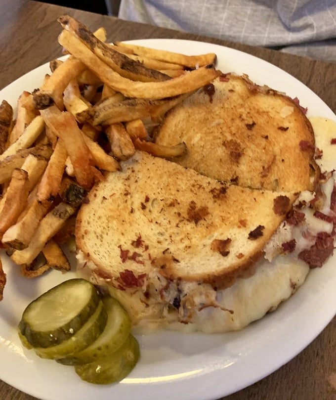 This isn't just a sandwich; it's a masterclass in comfort food engineering&mdash;melty cheese, toasty bread, and those perfectly crisp fries.
