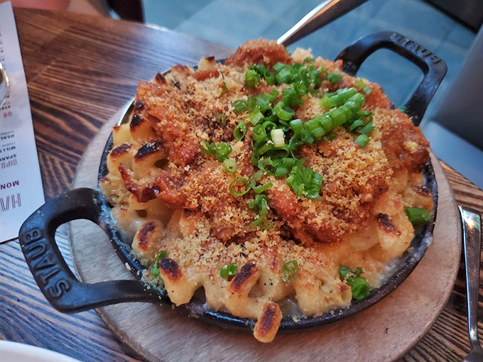 Mac and cheese gets the royal treatment with a crown of crispy breadcrumbs and green onions&mdash;comfort food that's dressed for a night out.