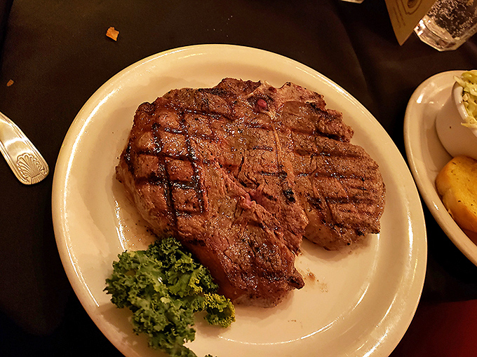 This ribeye isn't just dinner&mdash;it's an event. The perfect char outside, tender pink inside, and that little sprig of broccoli pretending it's the main attraction.