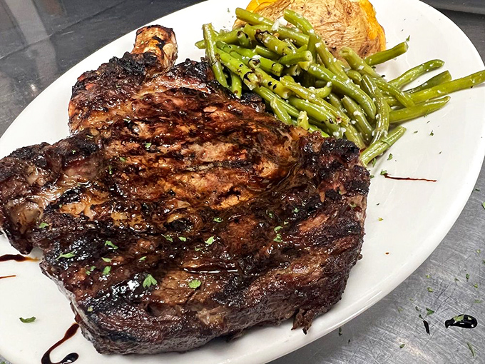 This isn't just a steak, it's a declaration of carnivorous intent&mdash;a perfectly charred ribeye that makes vegetarians question their life choices.