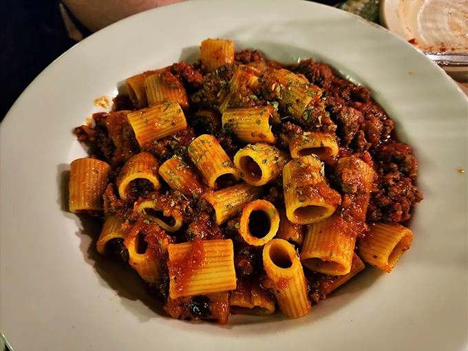 Rigatoni Bolognese that doesn't just sit on the plate &ndash; it practically demands to be twirled, savored, and remembered long after dinner ends.