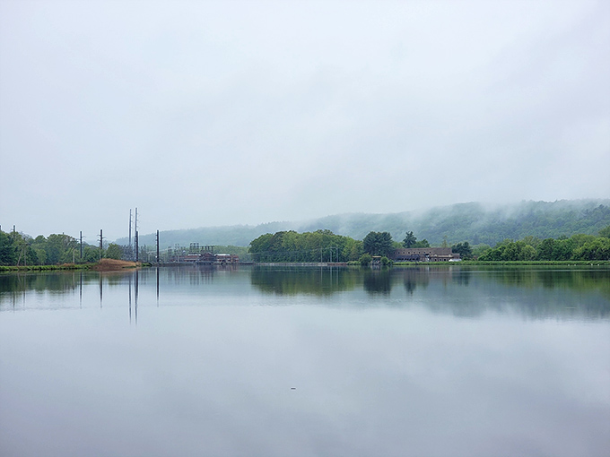 Rock Dam creates mirror-perfect reflections that make you wonder if nature's just showing off for the new retirees now.