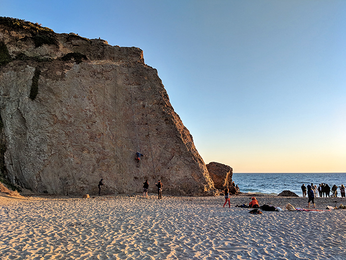 Rock climbers test their skills against Point Dume's imposing cliff face, turning what most of us see as an obstacle into their personal playground.