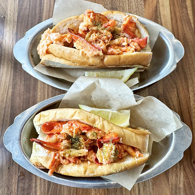 Lobster rolls that answer the eternal question: "How much lobster can you legally stuff into bread before it becomes a felony?"