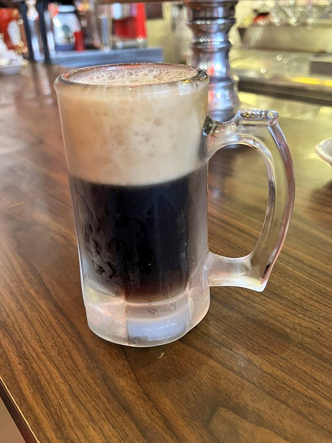 The root beer float: childhood nostalgia in a frosty mug. This isn't just a drink, it's a time machine to simpler days.