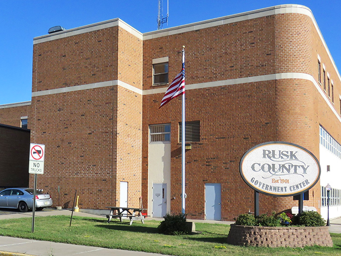The Rusk County Government Center stands as a brick-and-mortar testament to small-town civic pride, where government still feels connected to the people it serves.