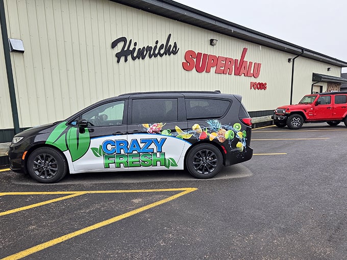 Hinrichs SuperValu isn't just a grocery store; it's Harvey's social hub where the "Crazy Fresh" van reminds us that small towns do freshness without the fuss.