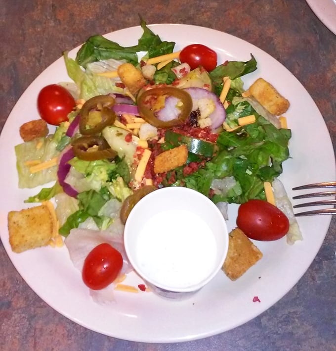 A garden party on a plate, where crisp vegetables and tangy dressing prepare you for the main event.