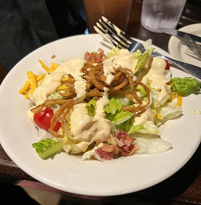 Even the salads get the royal treatment here, proving vegetables can be more than just the opening act before the beef headliner.